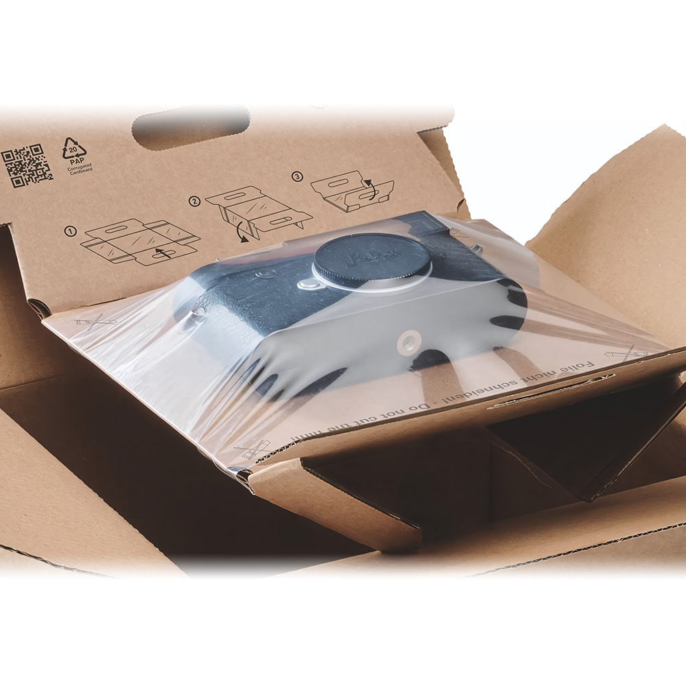 Boîte carton à film de calage intégré pour envoi postal sécurisé